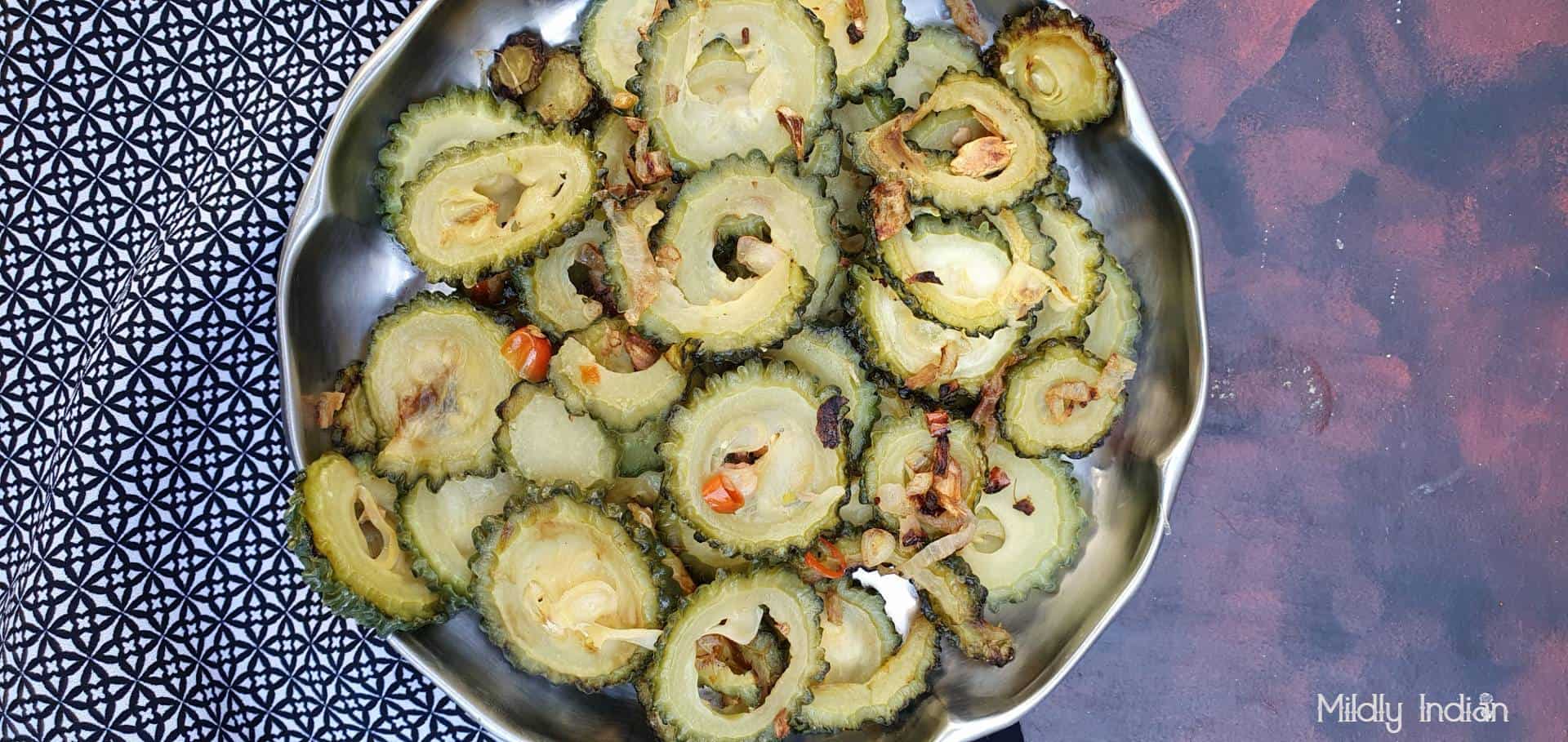 Kaipakka mezhukuperatti – Bitter gourd stir fry – Mildly Indian