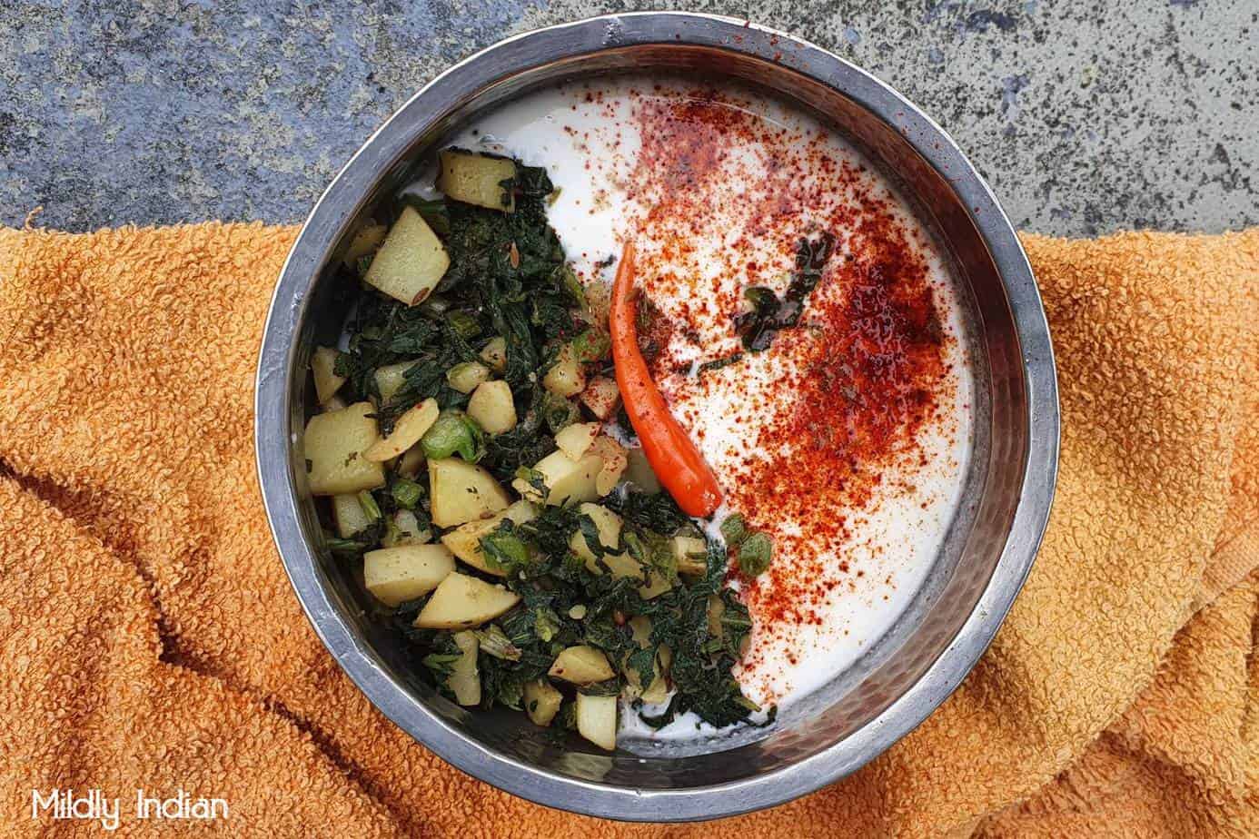 Potato and pumpkin leaf raita salad – Mildly Indian