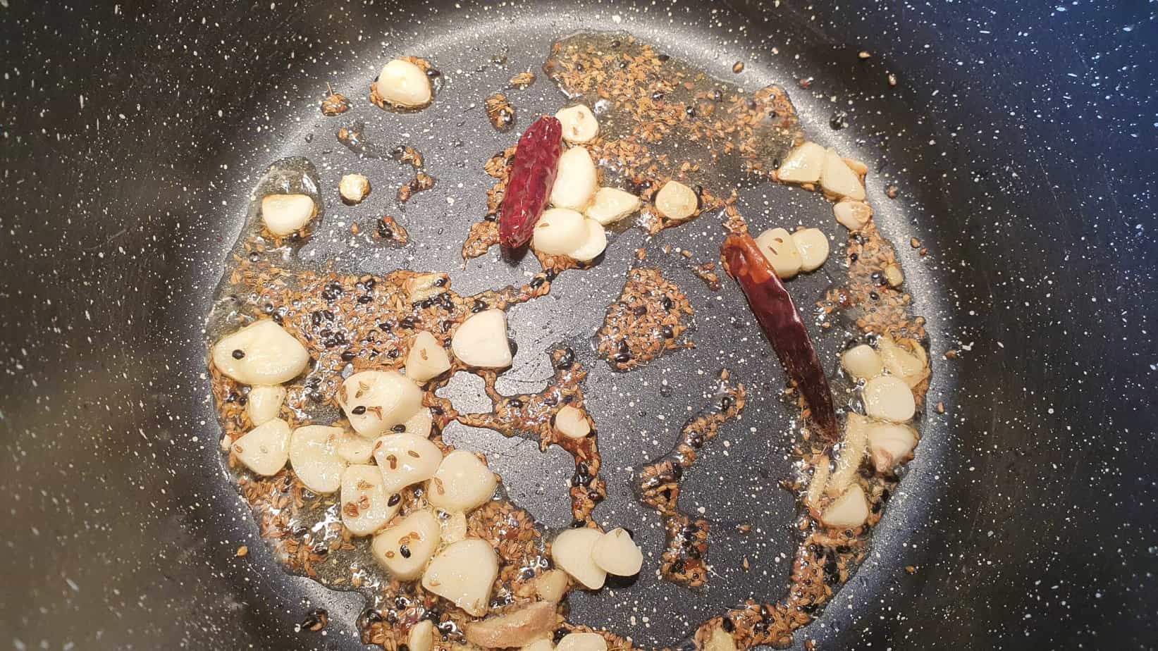 Kolmi shaak baaja | Water spinach stirfry – Mildly Indian