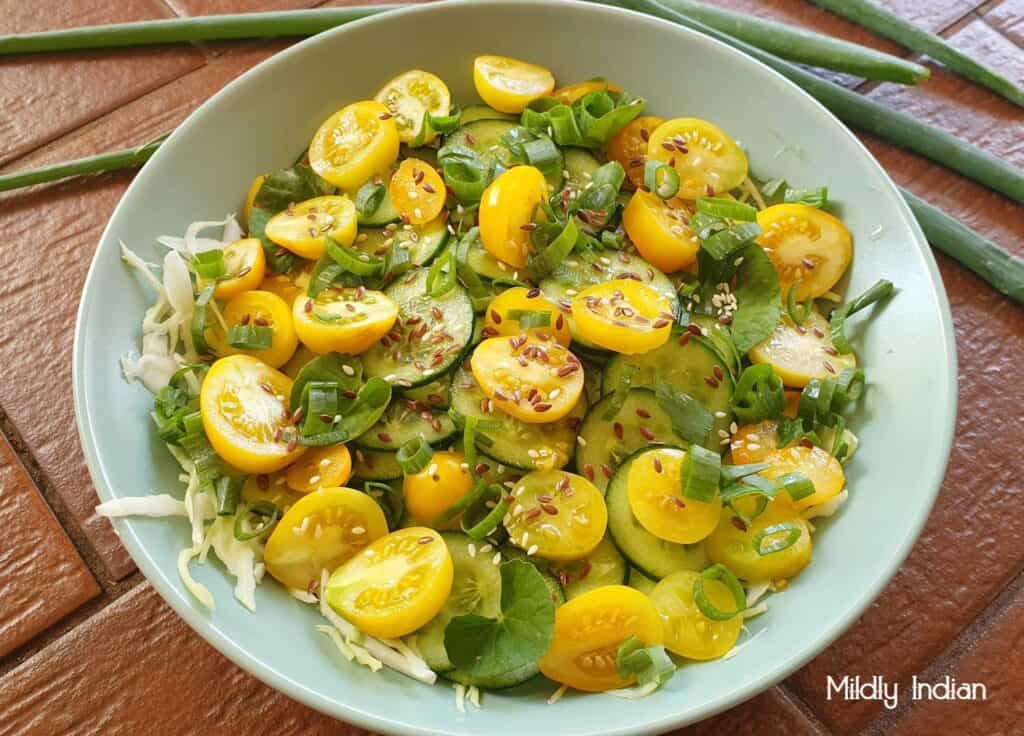 Yellow tomato salad with cabbage and cucumbers – Mildly Indian